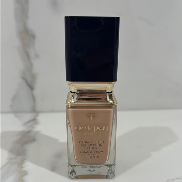 cle de peau | Makeup | Radiant Fluid Foundation Natural Beige | Poshmark